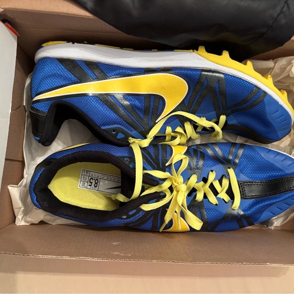 Nike | Shoes | Nike Womens Blue And Yellow Track Cleats | Poshmark